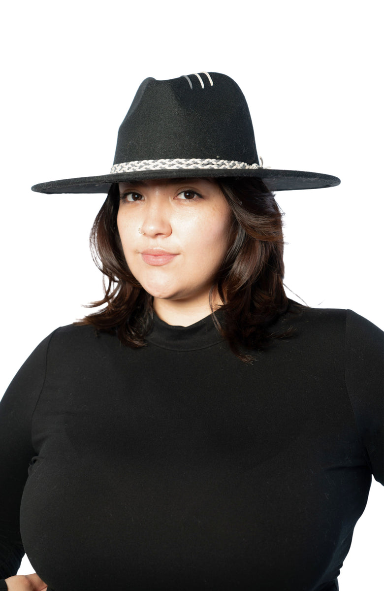 The June Hat – Marcus Adler